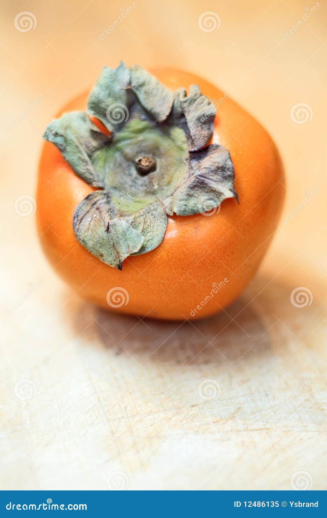 Khaki fruit on wood stock image. Image of orange, wood - 12486135