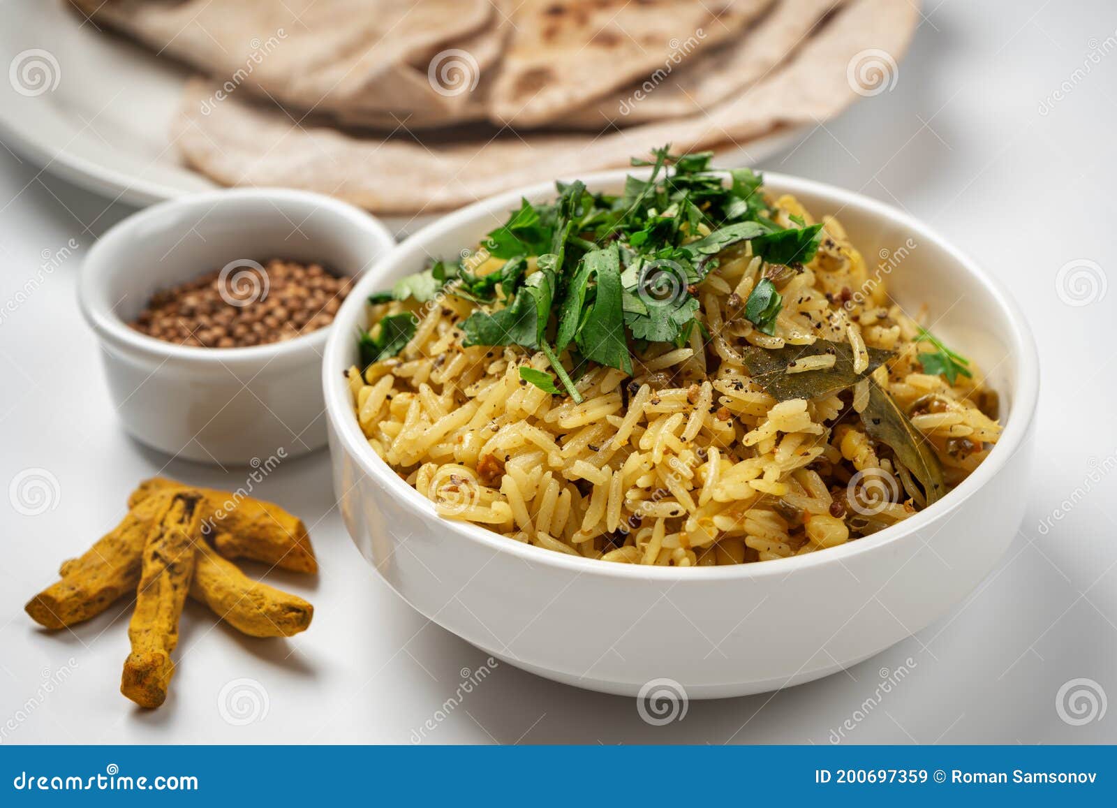 Kichari in a White Plate on a Light Table Near the Condiments Stock ...