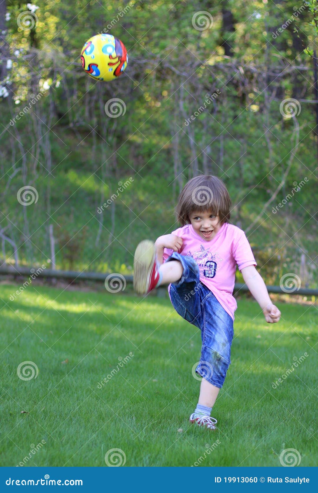 Kick a ball stock photo. Image of ball, lawn, active - 19913060