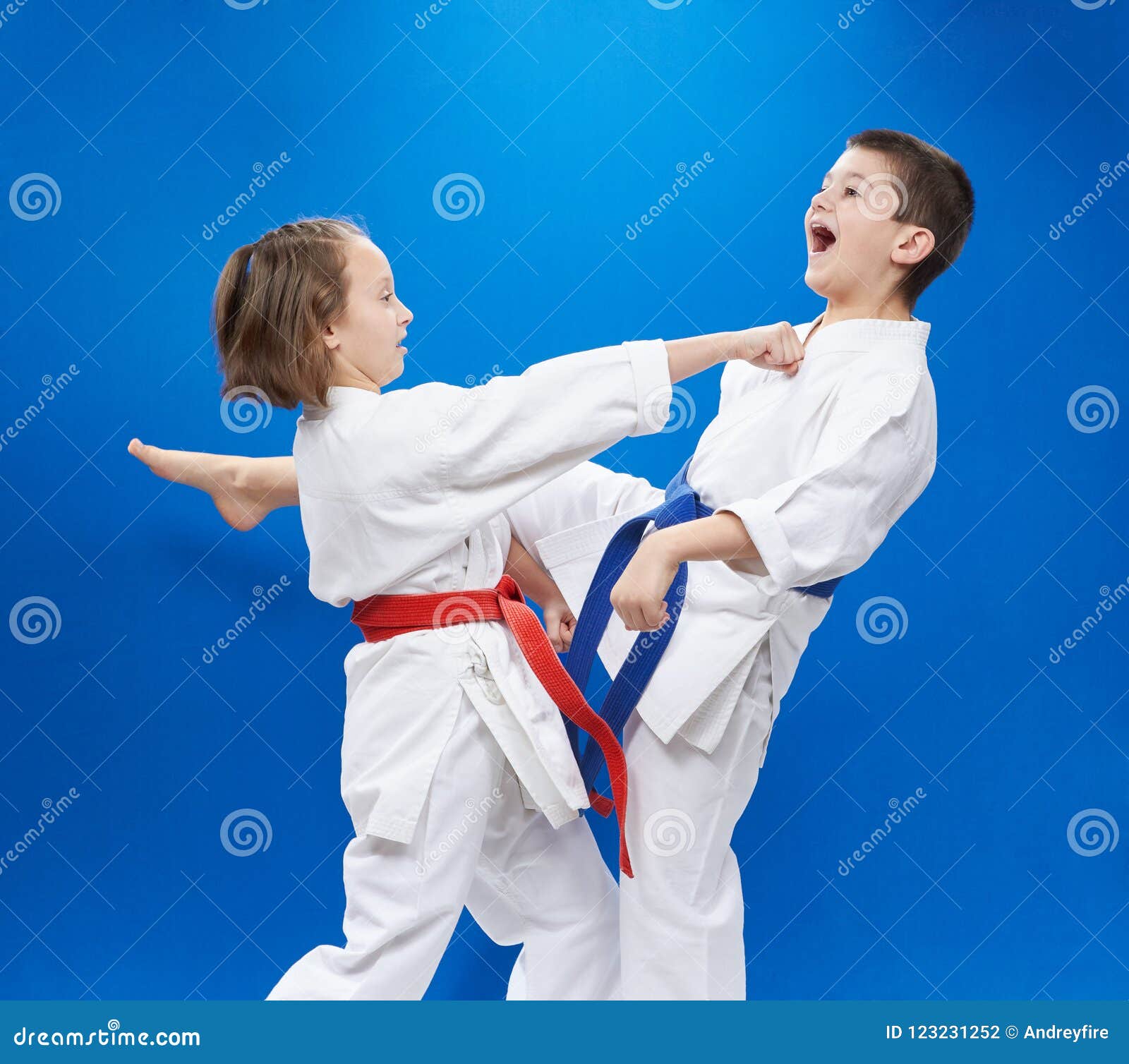 Kick Leg and Punch Arm are Beating the Little Athletes Stock Photo ...