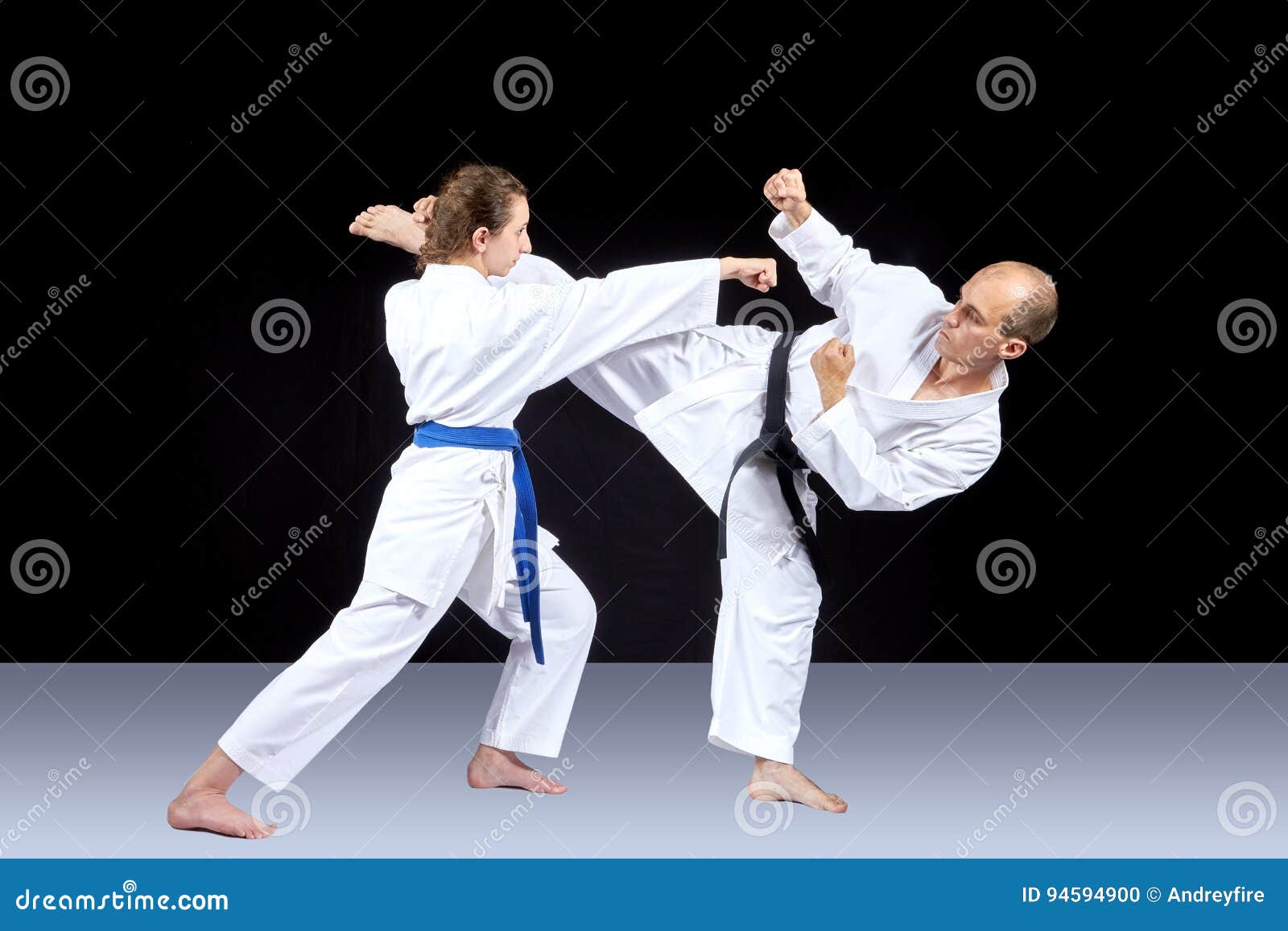 Kick Leg and Striking with a Hand are Trained by Athletes Stock Photo ...