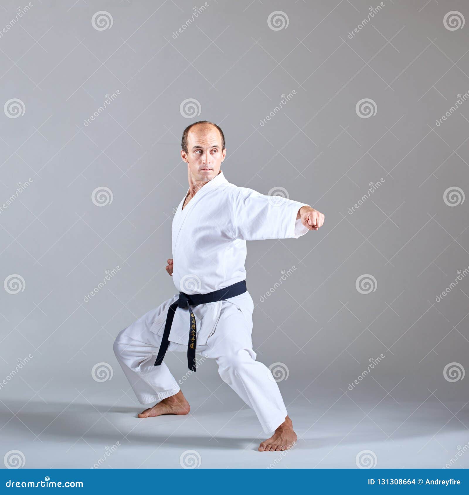 A Kick is Trained by an Athlete in a Formal Karate Exercise Stock Photo ...