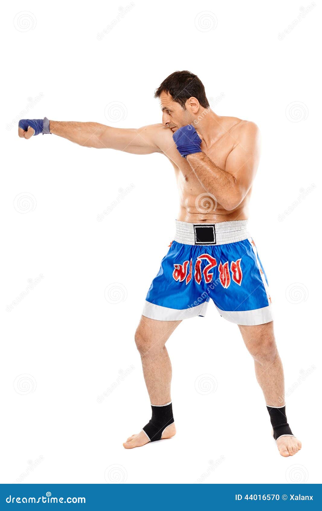 Kickbox Fighter Executing a Punch Stock Photo - Image of fighter ...