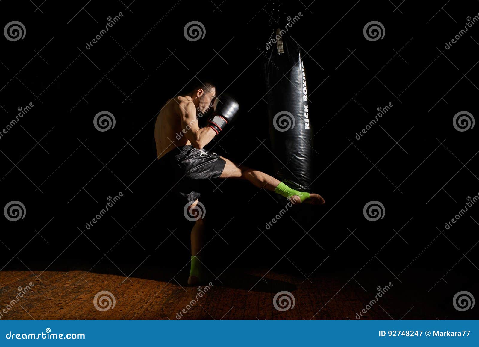 Kickbox Fighter Training in a Gym with Punch Bag. Stock Image - Image ...