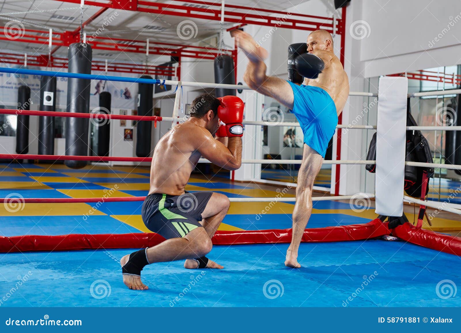 Kickbox Fighters Sparring in the Ring Stock Image - Image of kickboxing ...