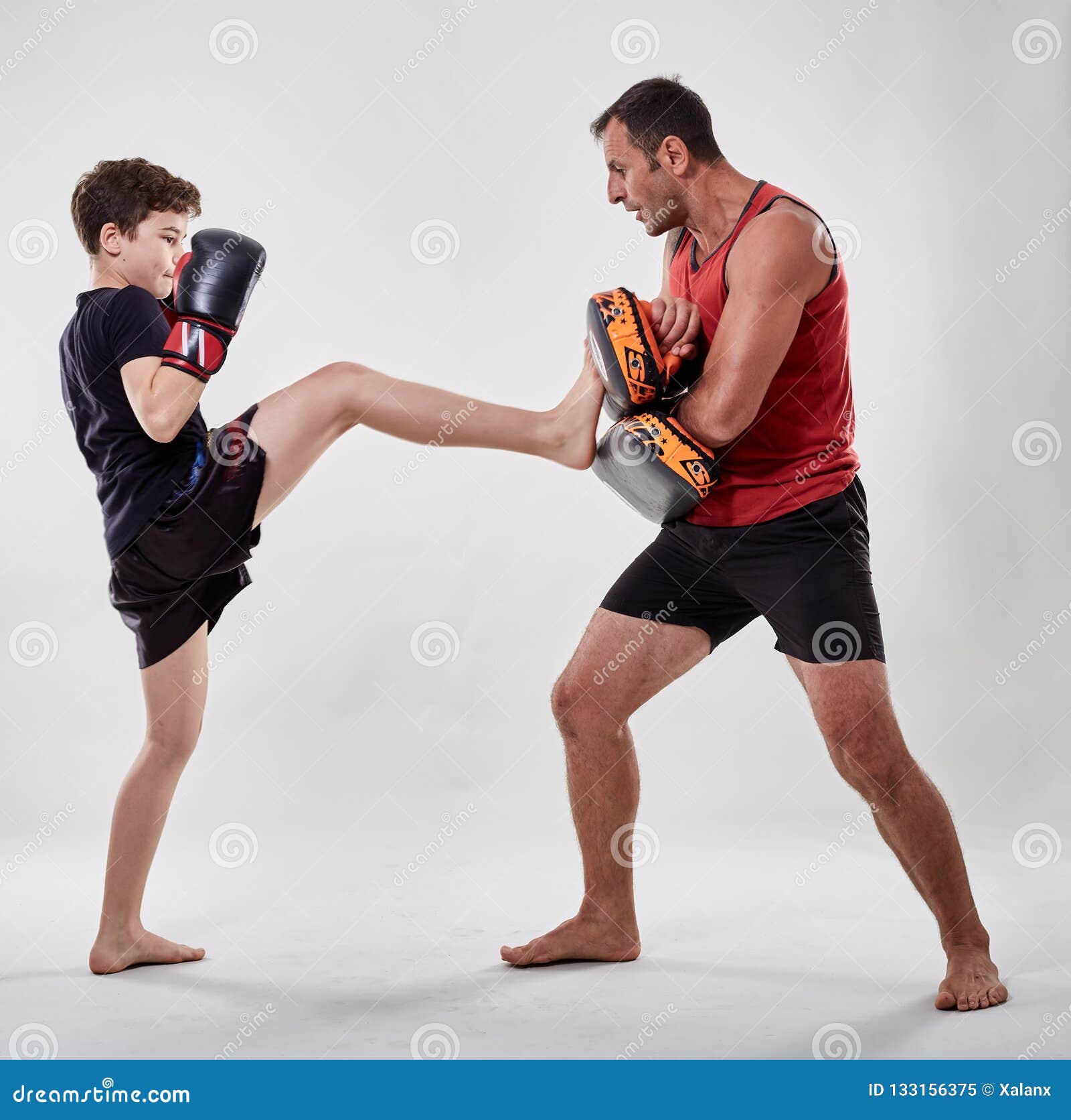 Kickboxer Kid and His Coach Stock Image - Image of fighter, pads: 133156375