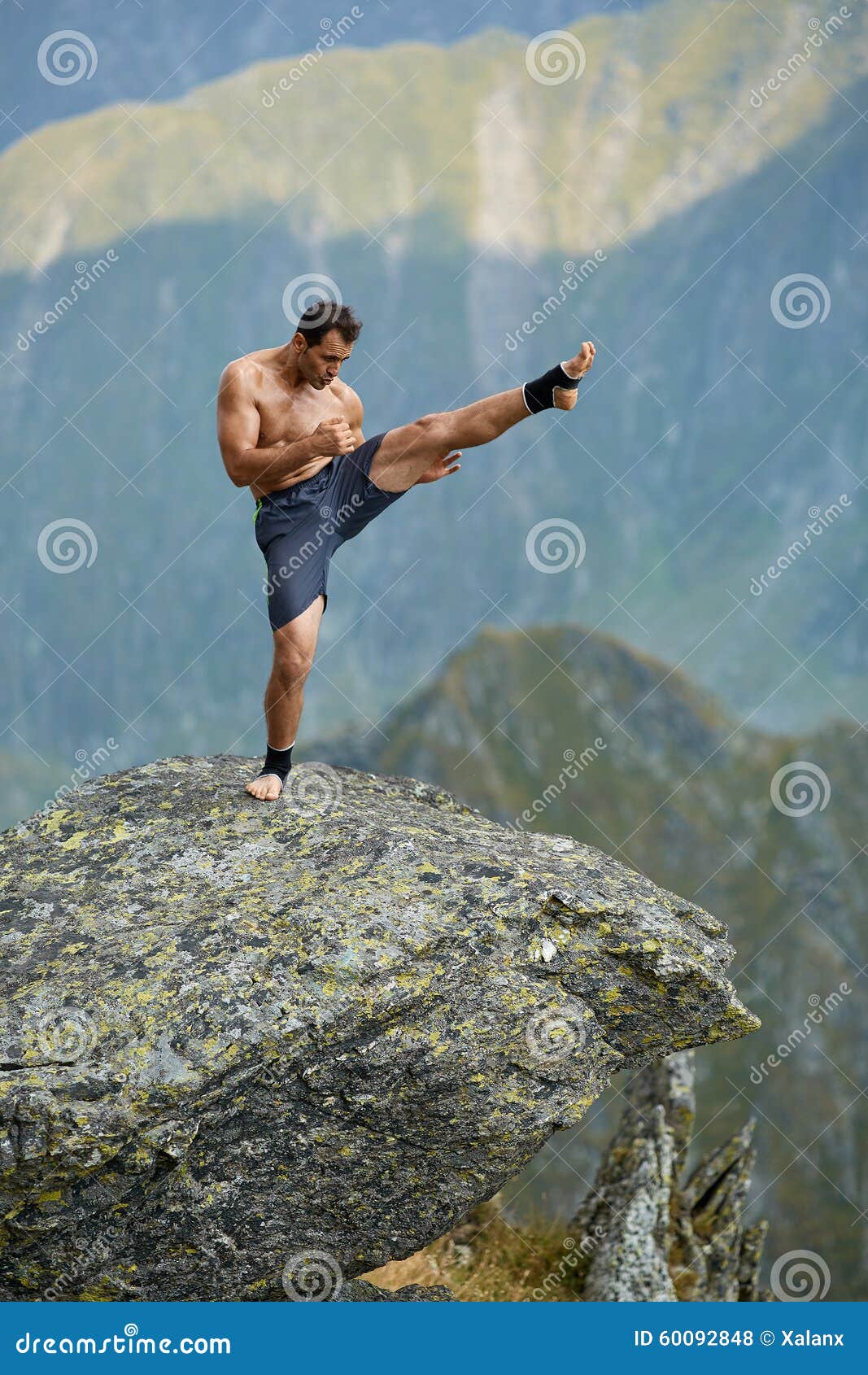 Kickboxer or Muay Thai Fighter Training on a Mountain Cliff Stock Photo ...