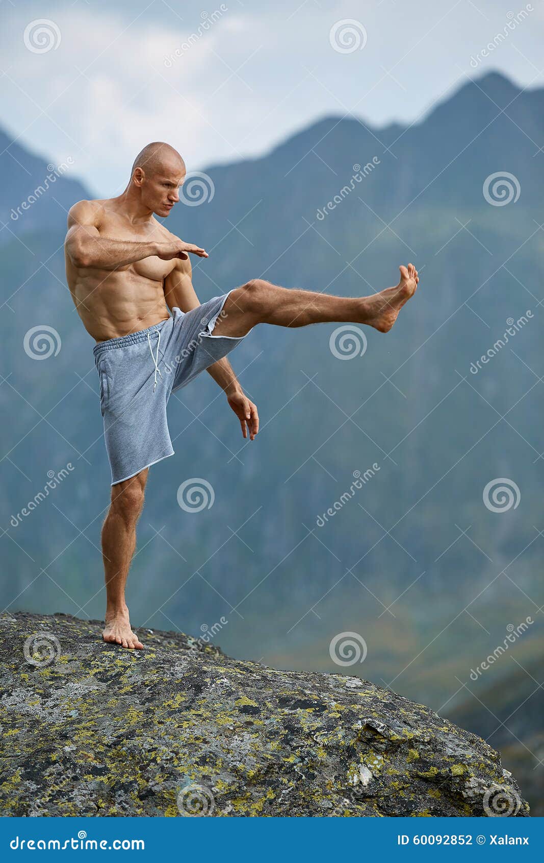 Kickboxer or Muay Thai Fighter Training on a Mountain Cliff Stock Photo ...
