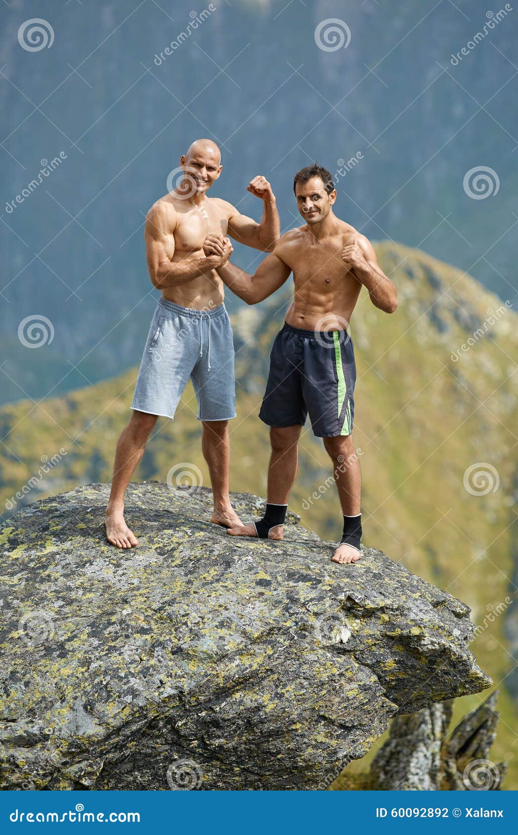 Kickboxers or Muay Thai Fighters on a Mountain Cliff Stock Photo ...