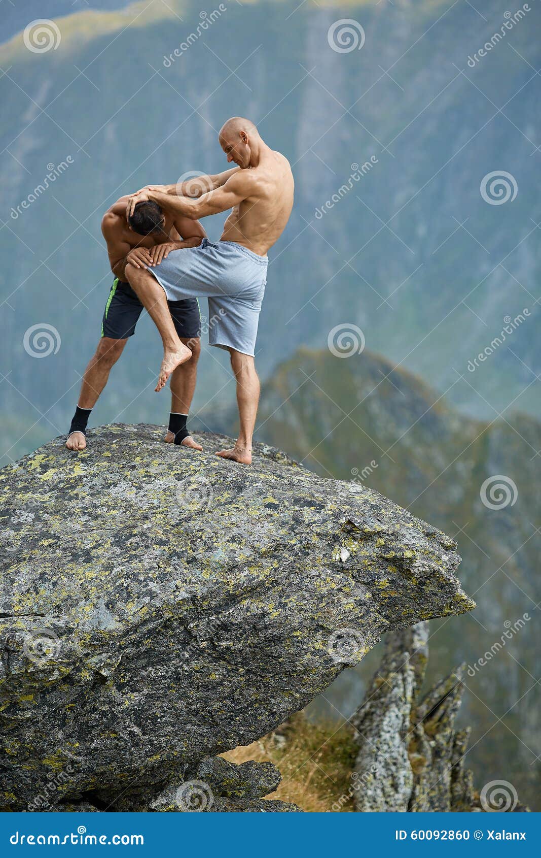 Kickboxers or Muay Thai Fighters Training on a Mountain Cliff Stock ...
