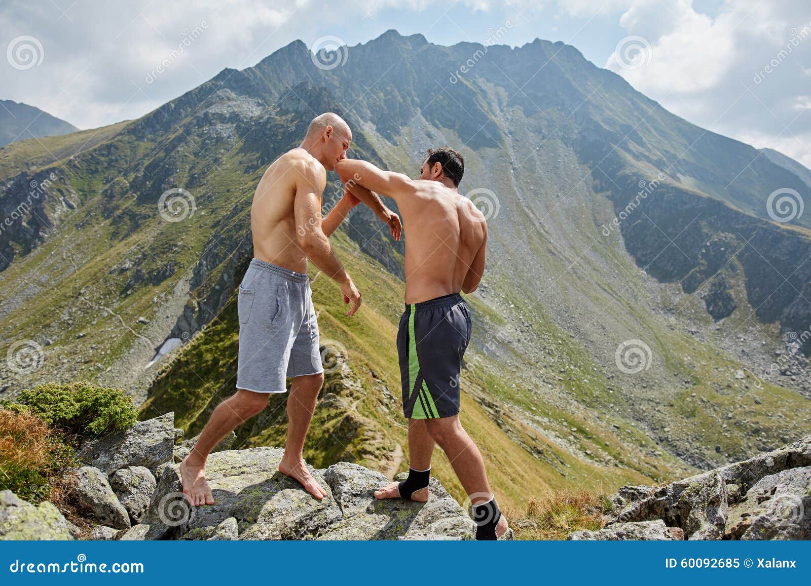 Kickboxers or Muay Thai Fighters Training in the Mountains Stock Image ...