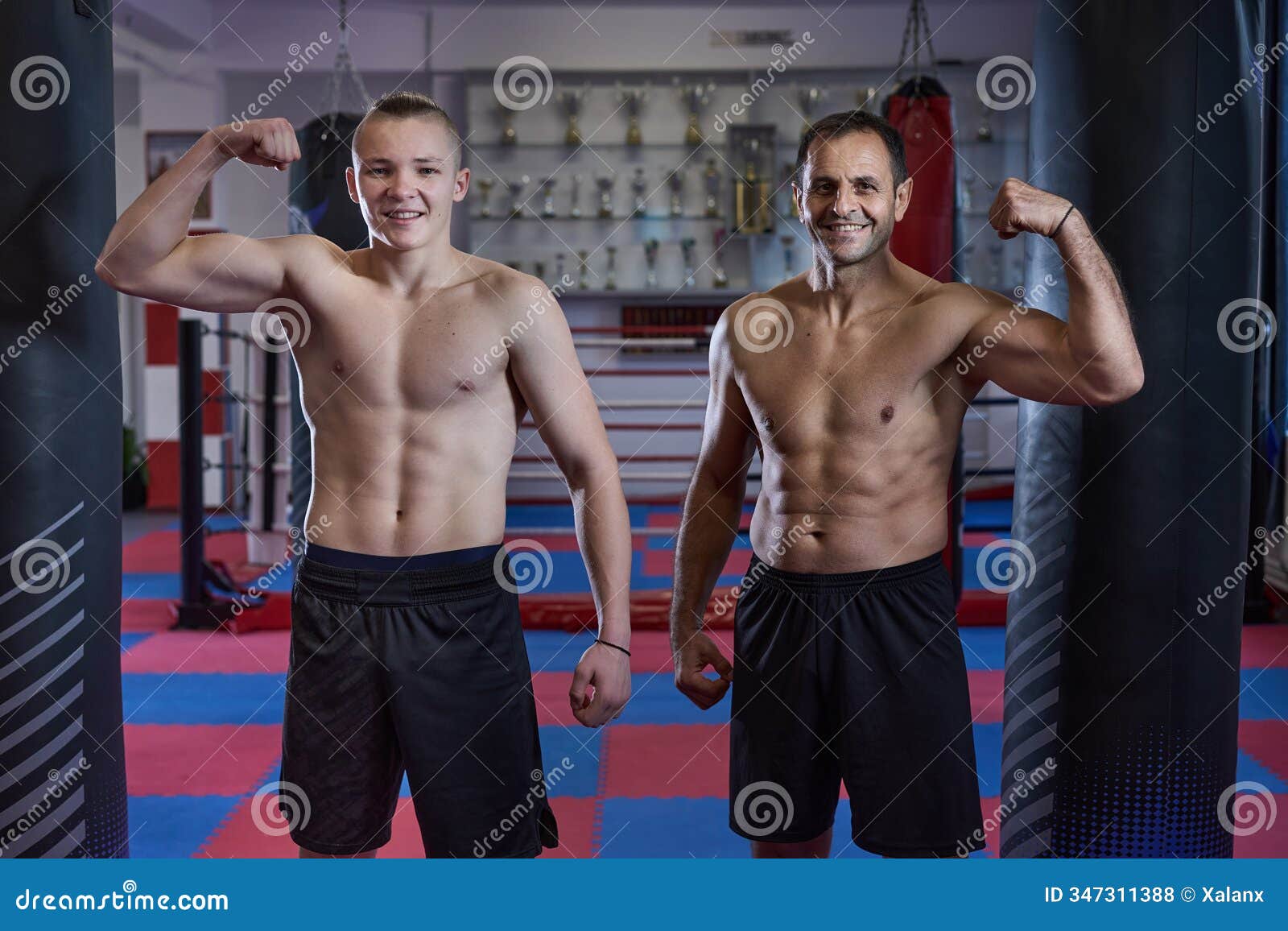 Kickboxing Coach and Student Posing in the Gym Stock Photo - Image of ...