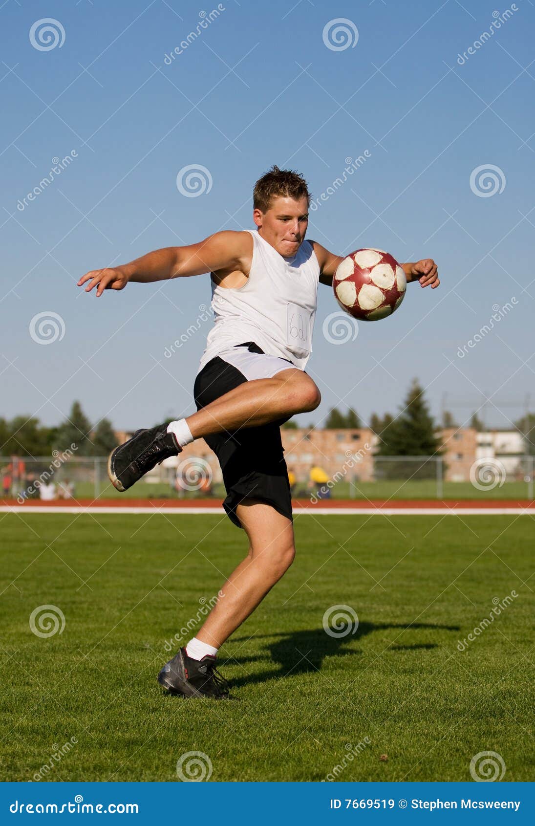 Kicking a soccer ball stock image. Image of competition - 7669519