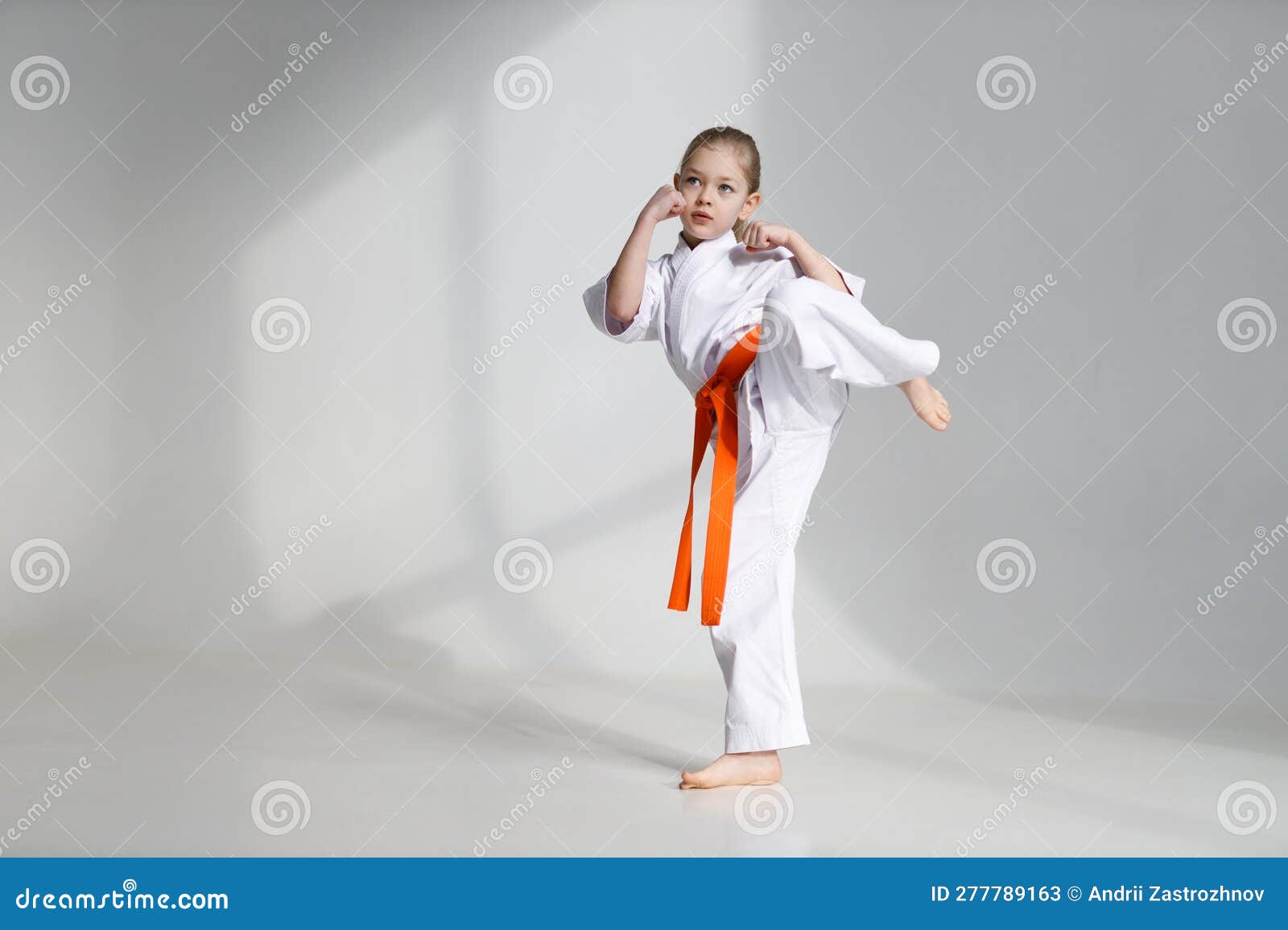 Kicking Stand, Karate Child on a White Background Stock Image - Image ...