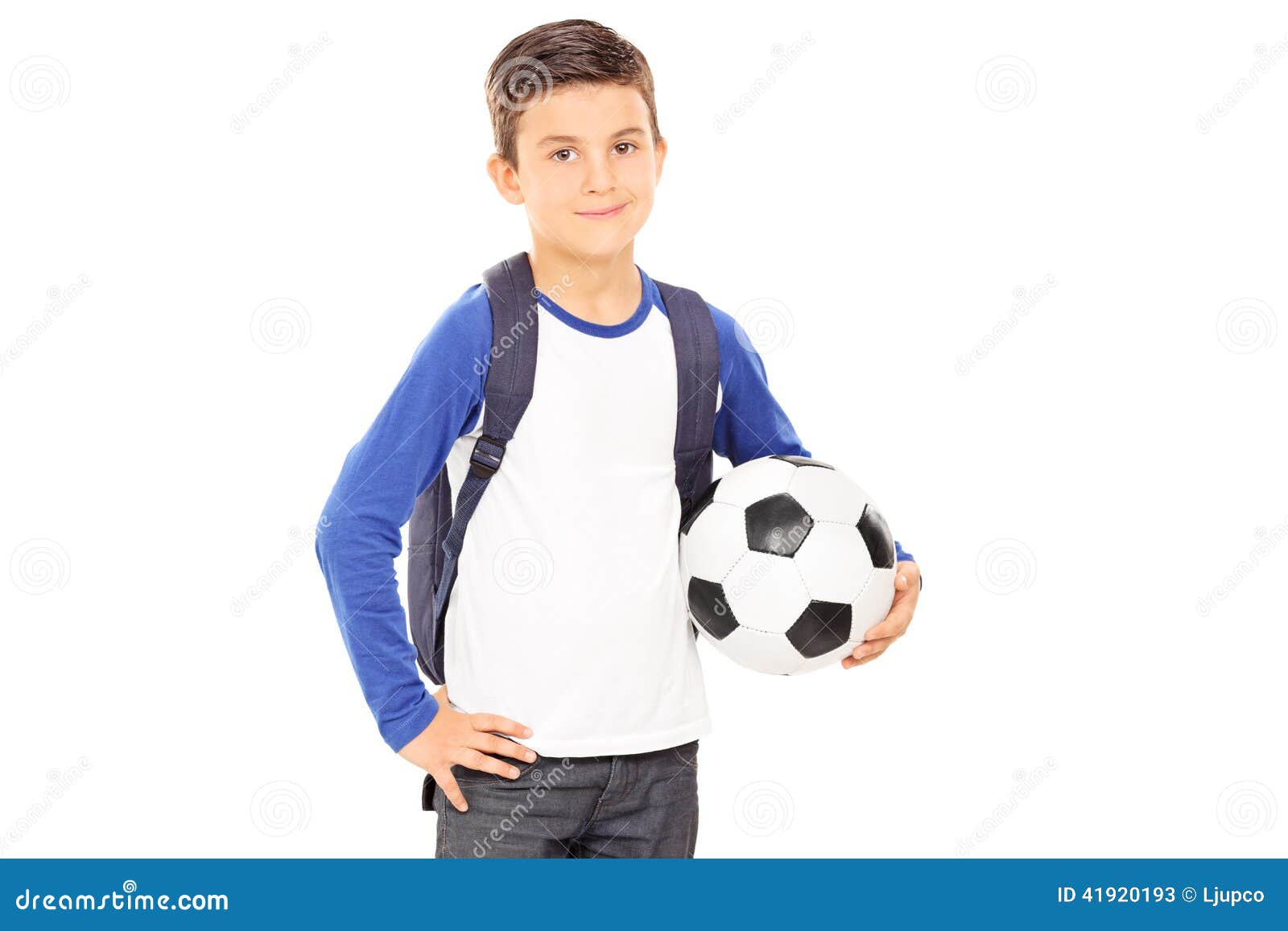 Kid with Backpack Holding a Football Stock Image - Image of smiling ...