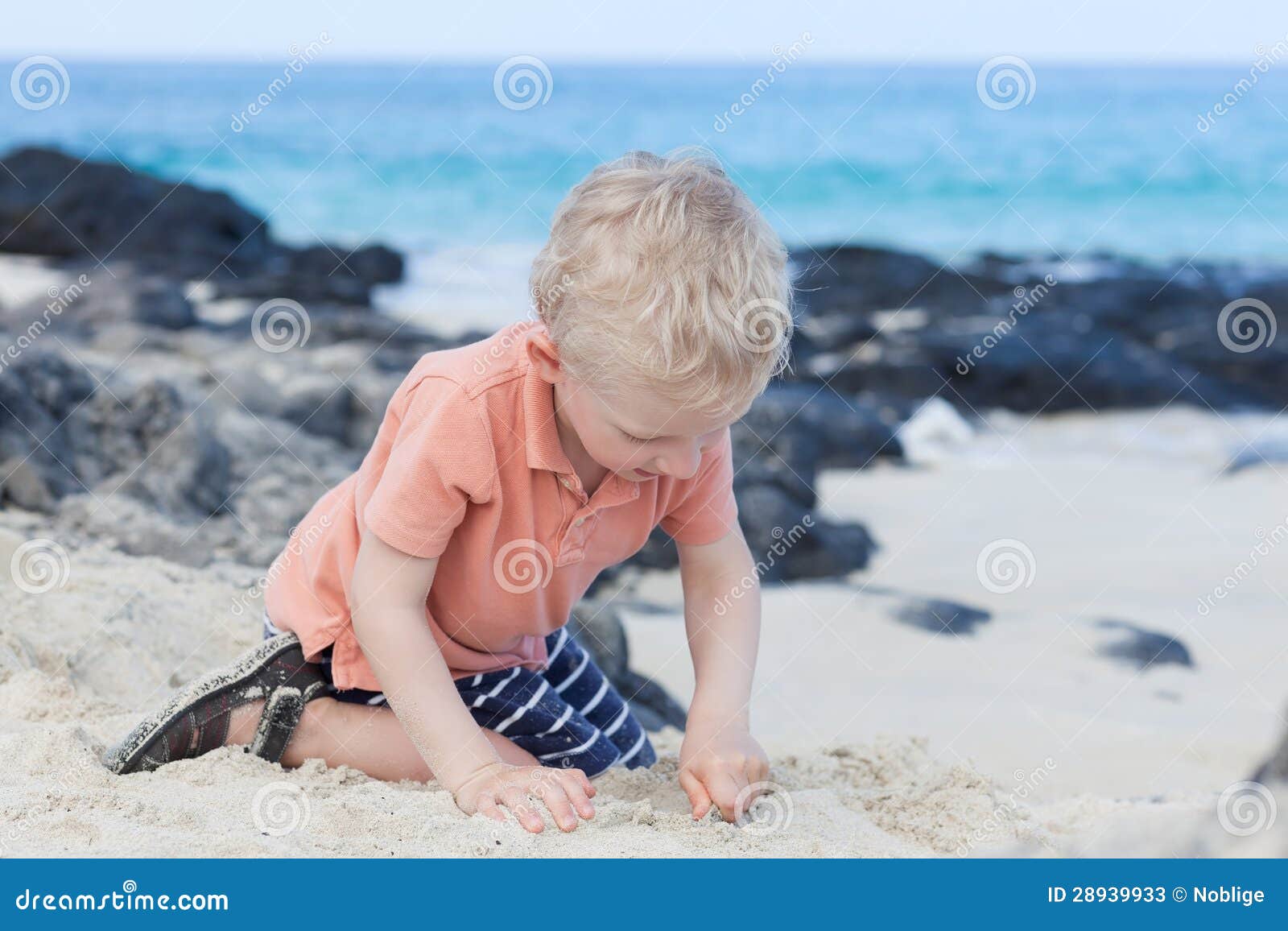 Kid at the beach stock image. Image of black, outside - 28939933