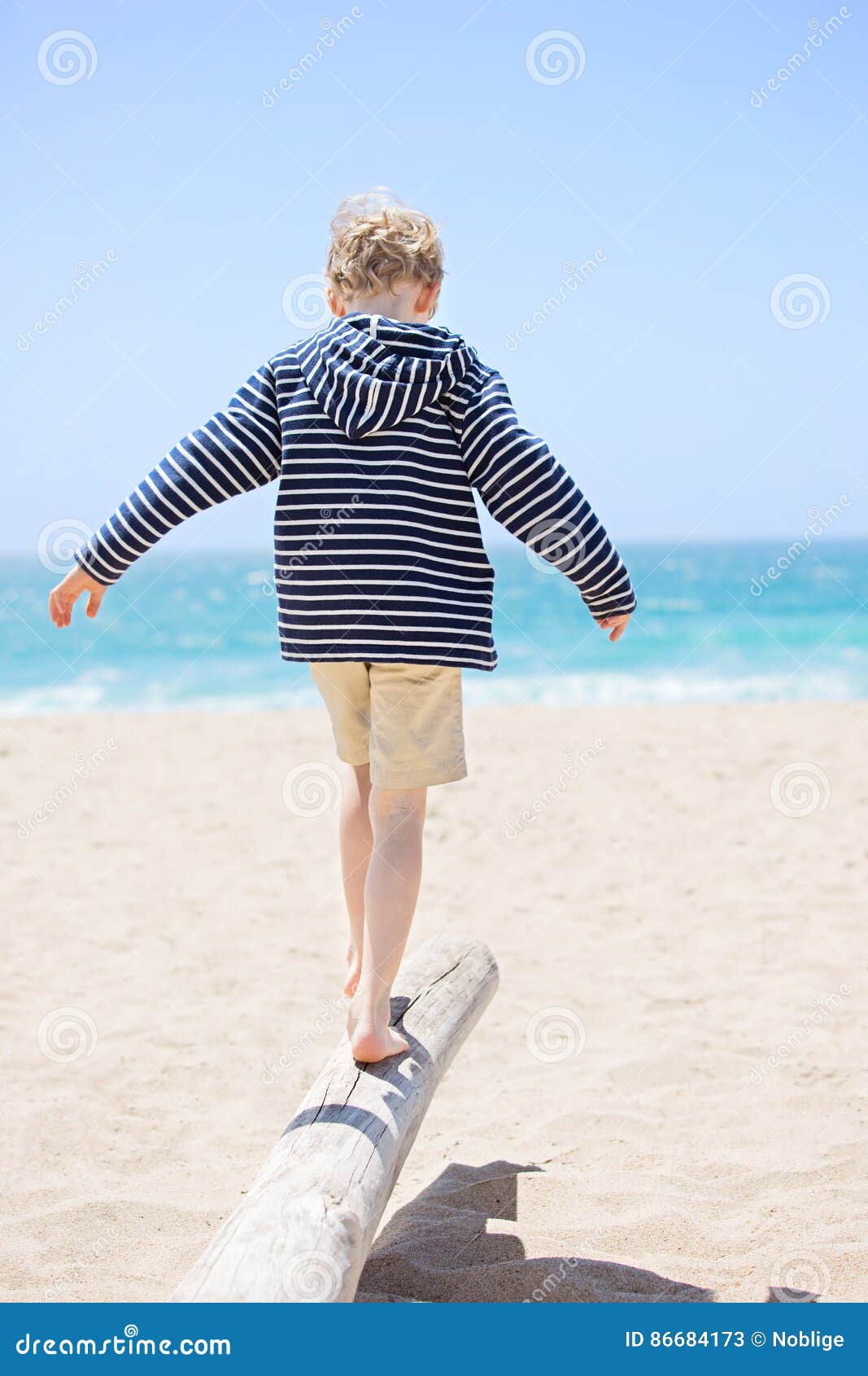 Kid at the beach stock image. Image of person, beautiful - 86684173