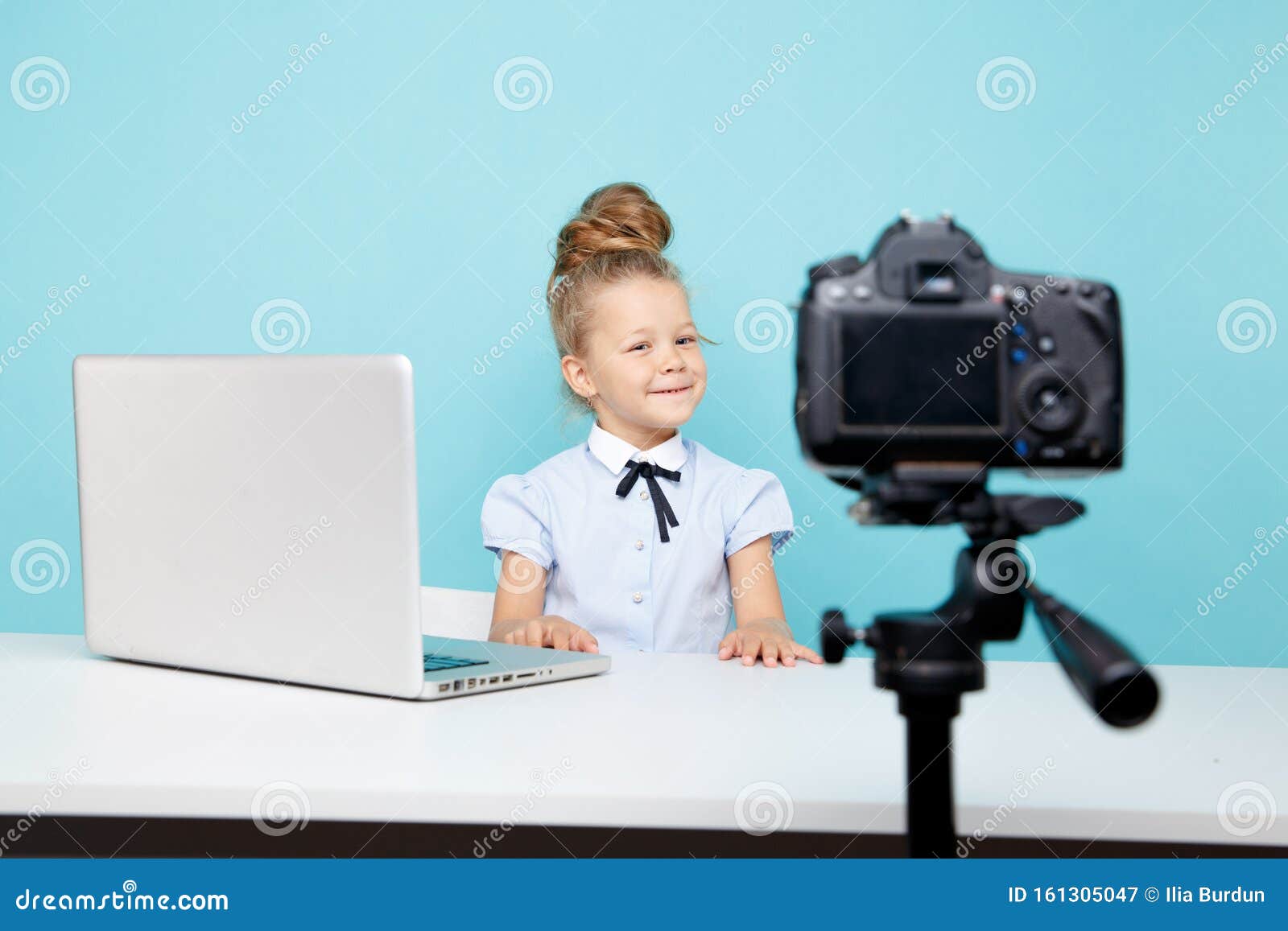 Kid Blogger Filming Video on Camera Working with the Laptop. Stock ...