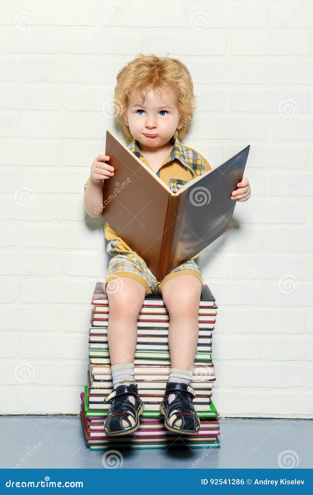 Kid with a book stock photo. Image of beautiful, cheerful - 92541286