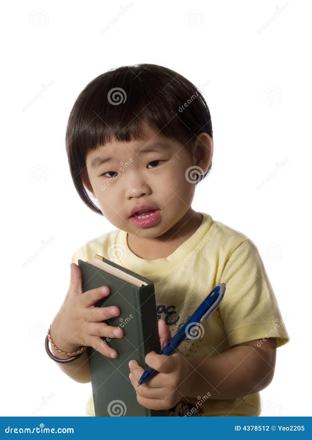 Kid with book and pen stock photo. Image of hold, young - 4378512
