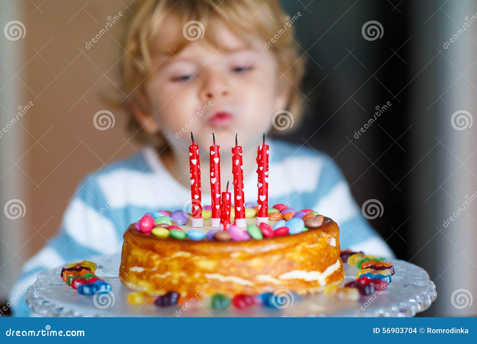 Kid Boy Celebrating His Birthday and Blowing Candles on Cake Stock ... Kid Boy Celebrating His Birthday and Blowing Candles on Cake Stock ...