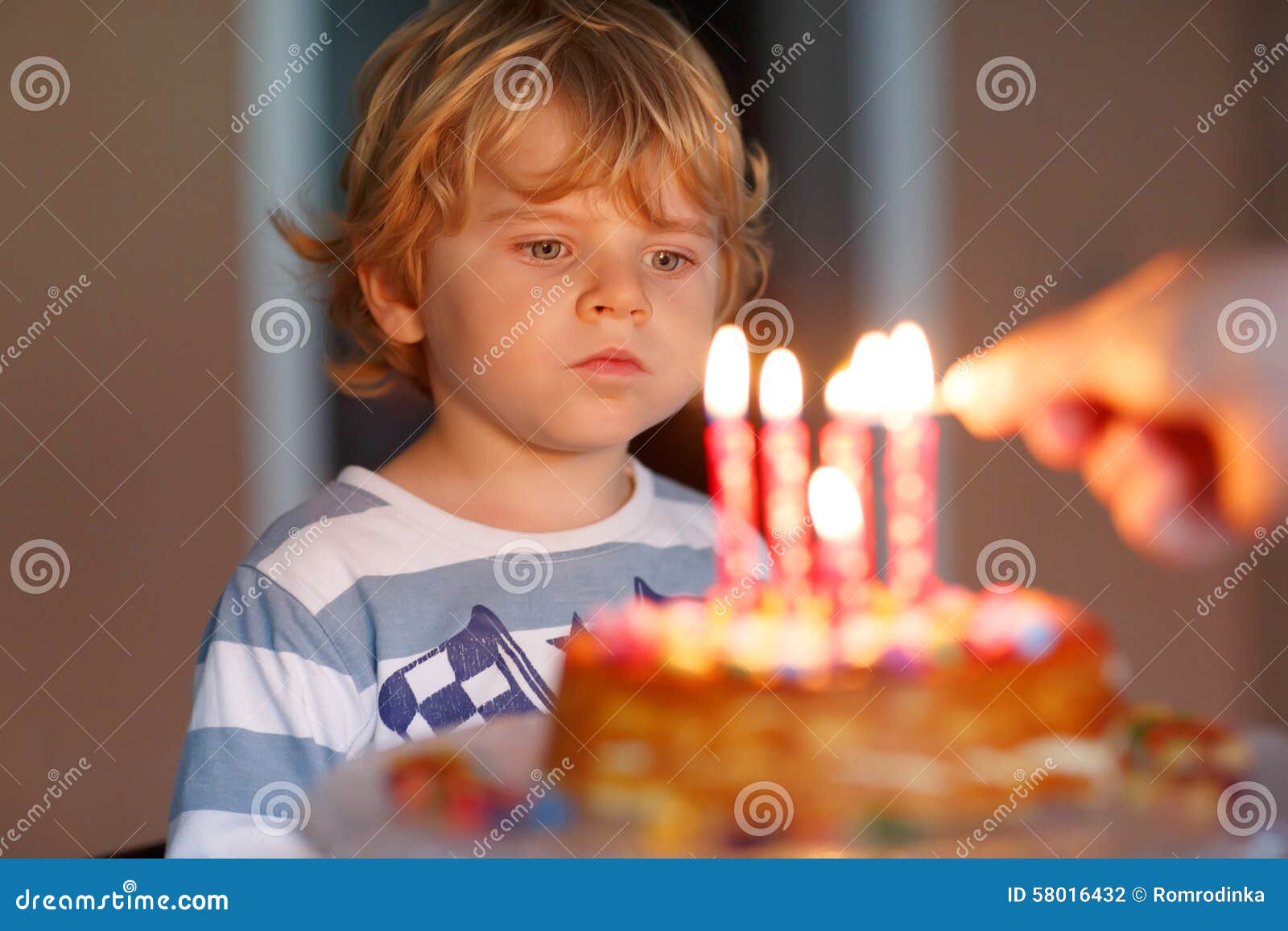 Kid Boy Celebrating His Birthday and Blowing Candles on Cake Stock ... Kid Boy Celebrating His Birthday and Blowing Candles on Cake Stock ...