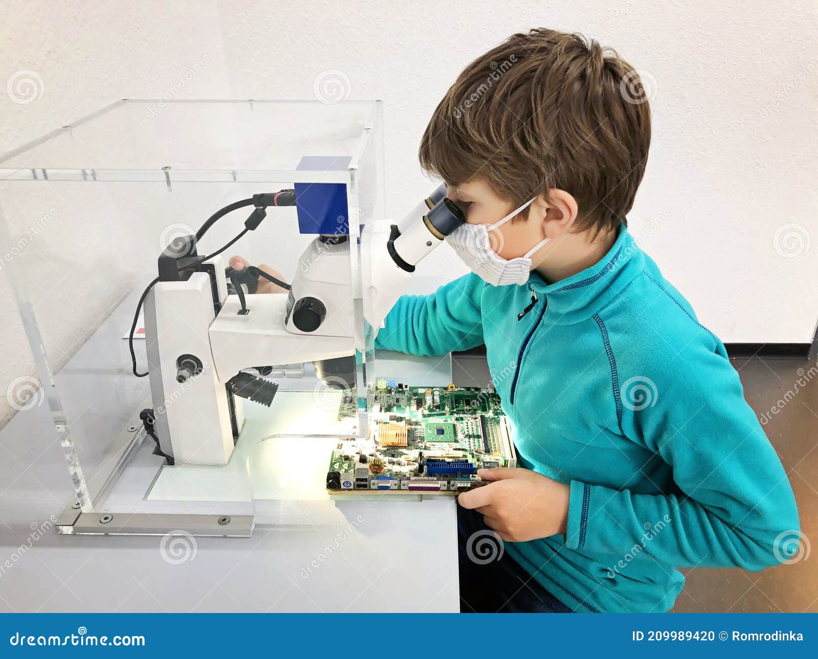 Kid Boy Conducts Experiment with Microscope in School Lab. Curious ...