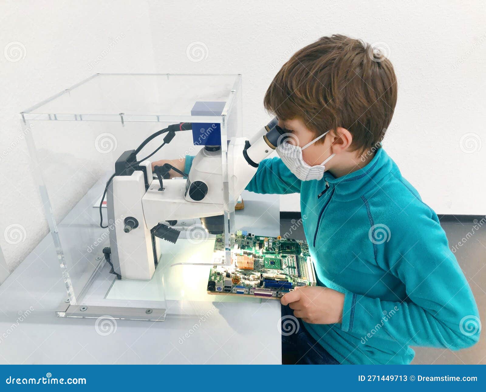 Kid Boy Conducts Experiment with Microscope in School Lab. Curious ...