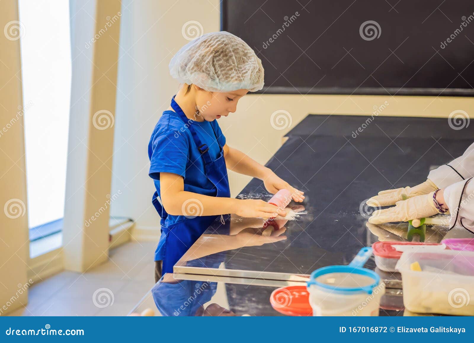 Kid Boy Enjoying Preparing Ingredients for Making Cakes.Boys Learn To ...