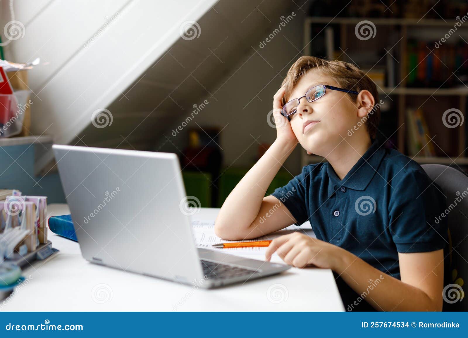 Kid Boy with Glasses Learning at Home on Laptop for School. Adorable ...