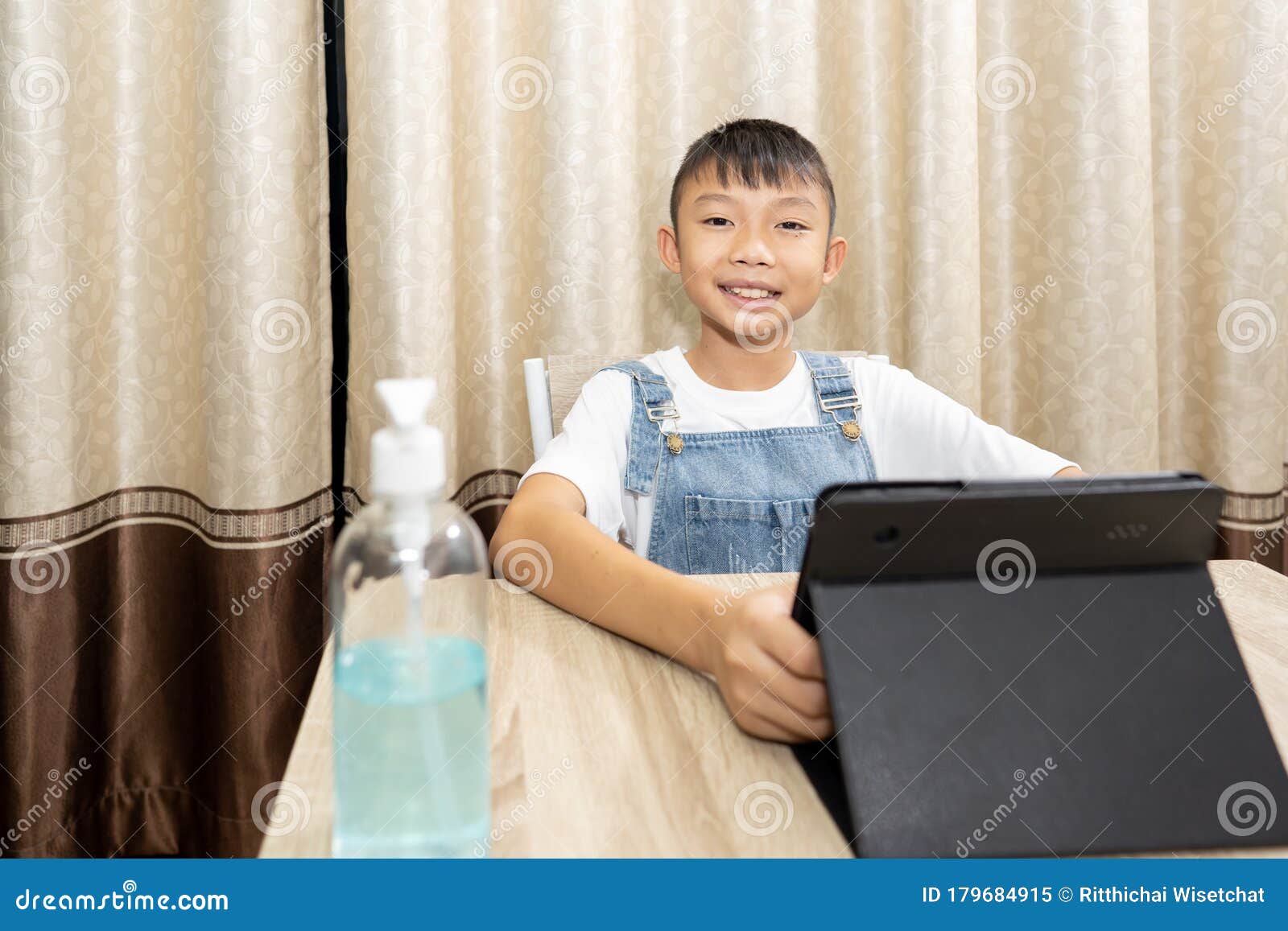 Kid Boy Learning Online on Tablet at Home Stock Image - Image of brush ...