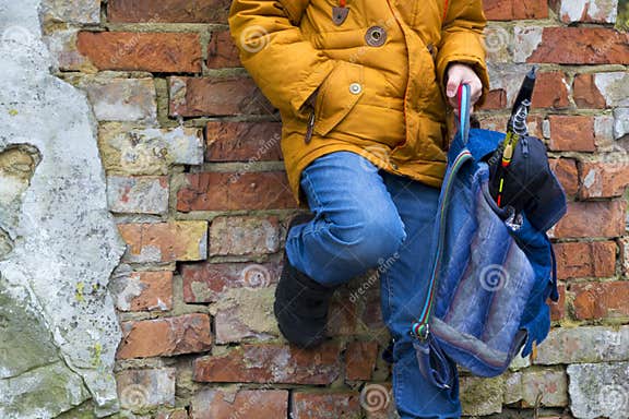 Kid Boy Legs and Backpack Against the Wall Stock Image - Image of jeans ...