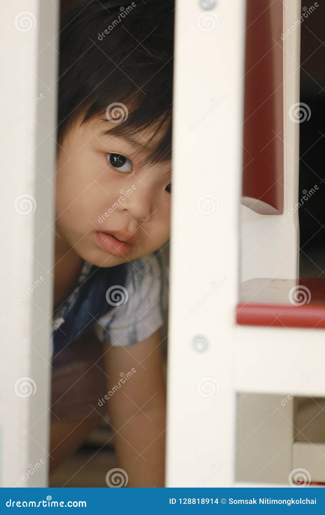Kid Boy Looking for Something through the Door Stock Photo - Image of ...