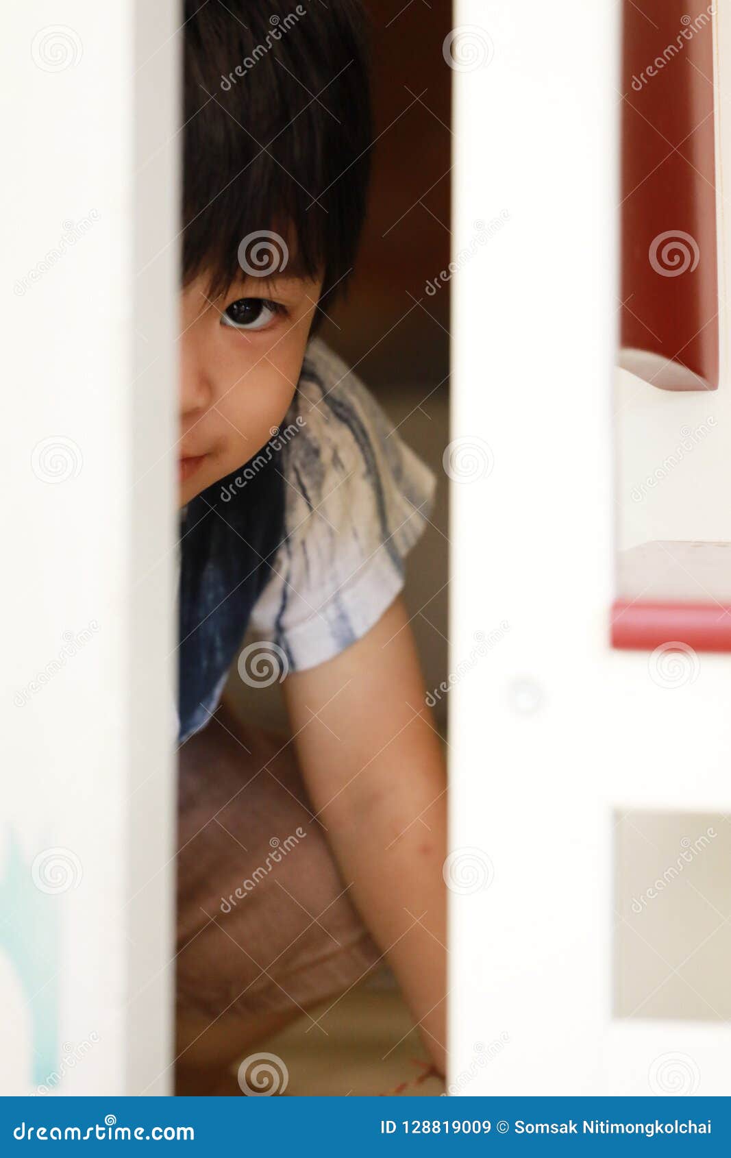 Kid Boy Looking for Something through the Door Stock Image - Image of ...
