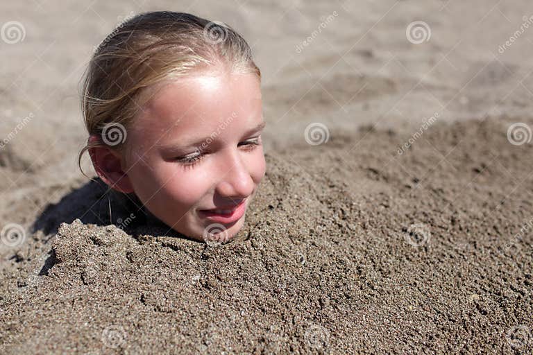Kid buried in sand stock photo. Image of caucasian, outdoor - 27538896