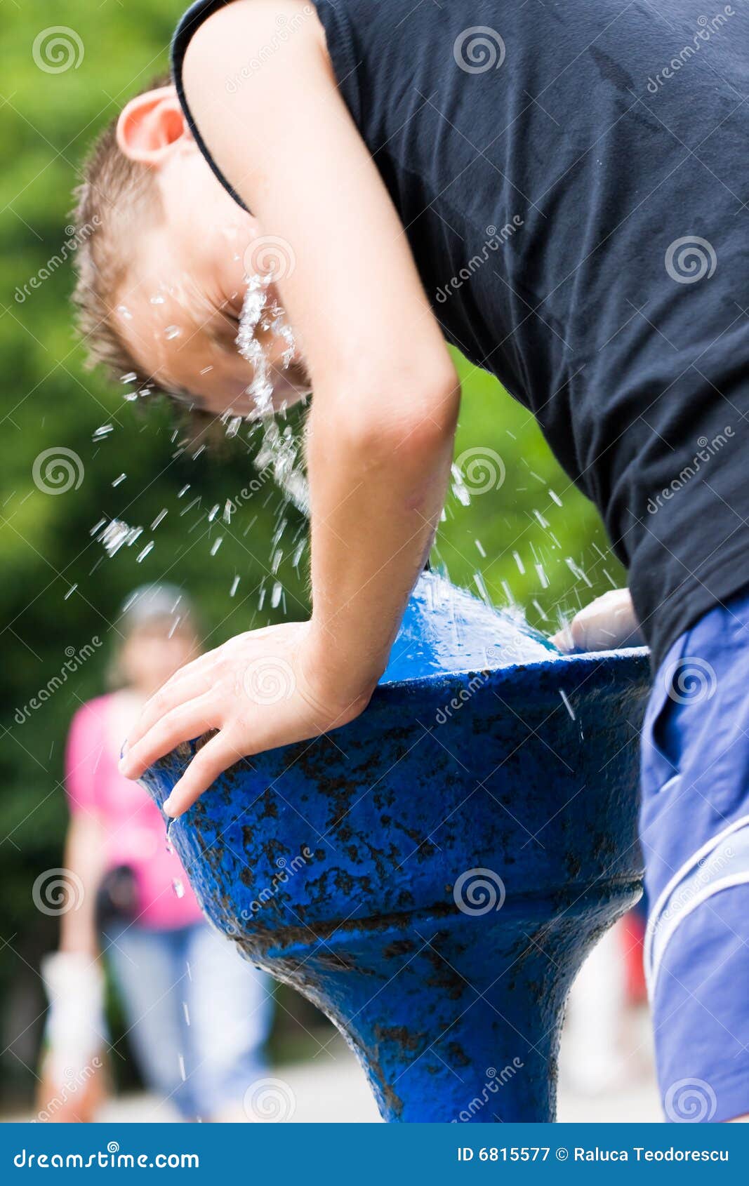 Kid Chilling with Water from a Street Tap Stock Image - Image of ...