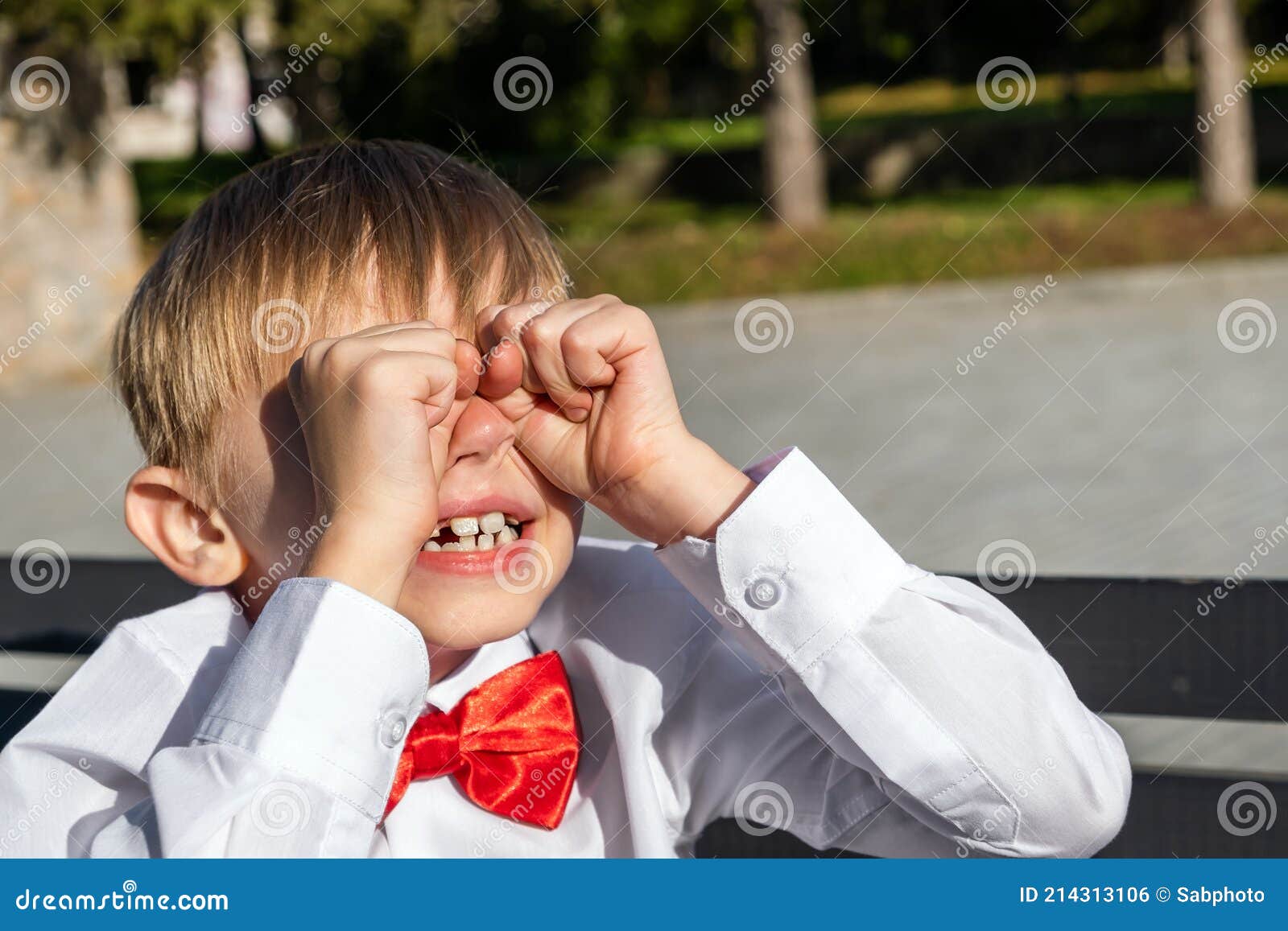 Kid close his Eyes stock photo. Image of schoolboy, elegant - 214313106