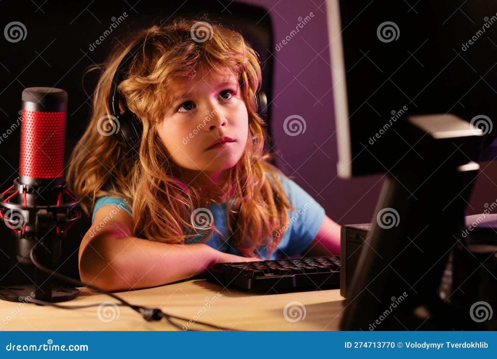 Kid with Computer Late at Night. Neon Blue Light. Stock Photo - Image ...