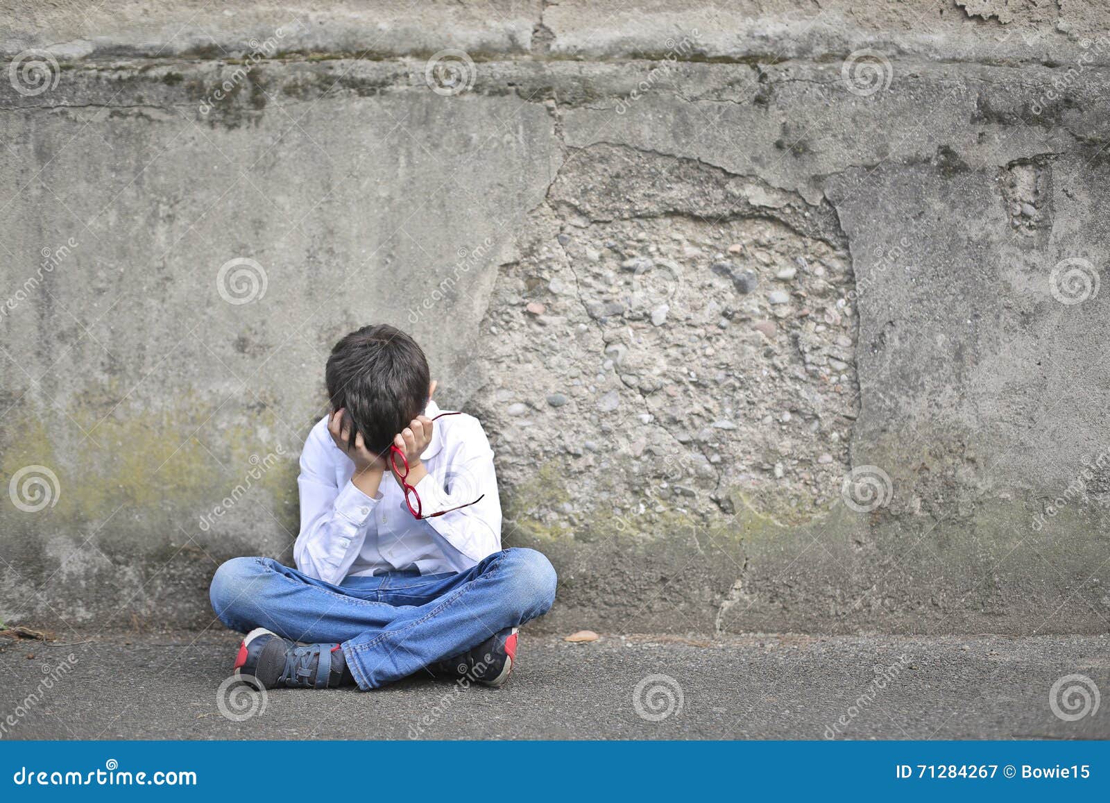 Kid crying stock image. Image of sitting, sadness, alone - 71284267