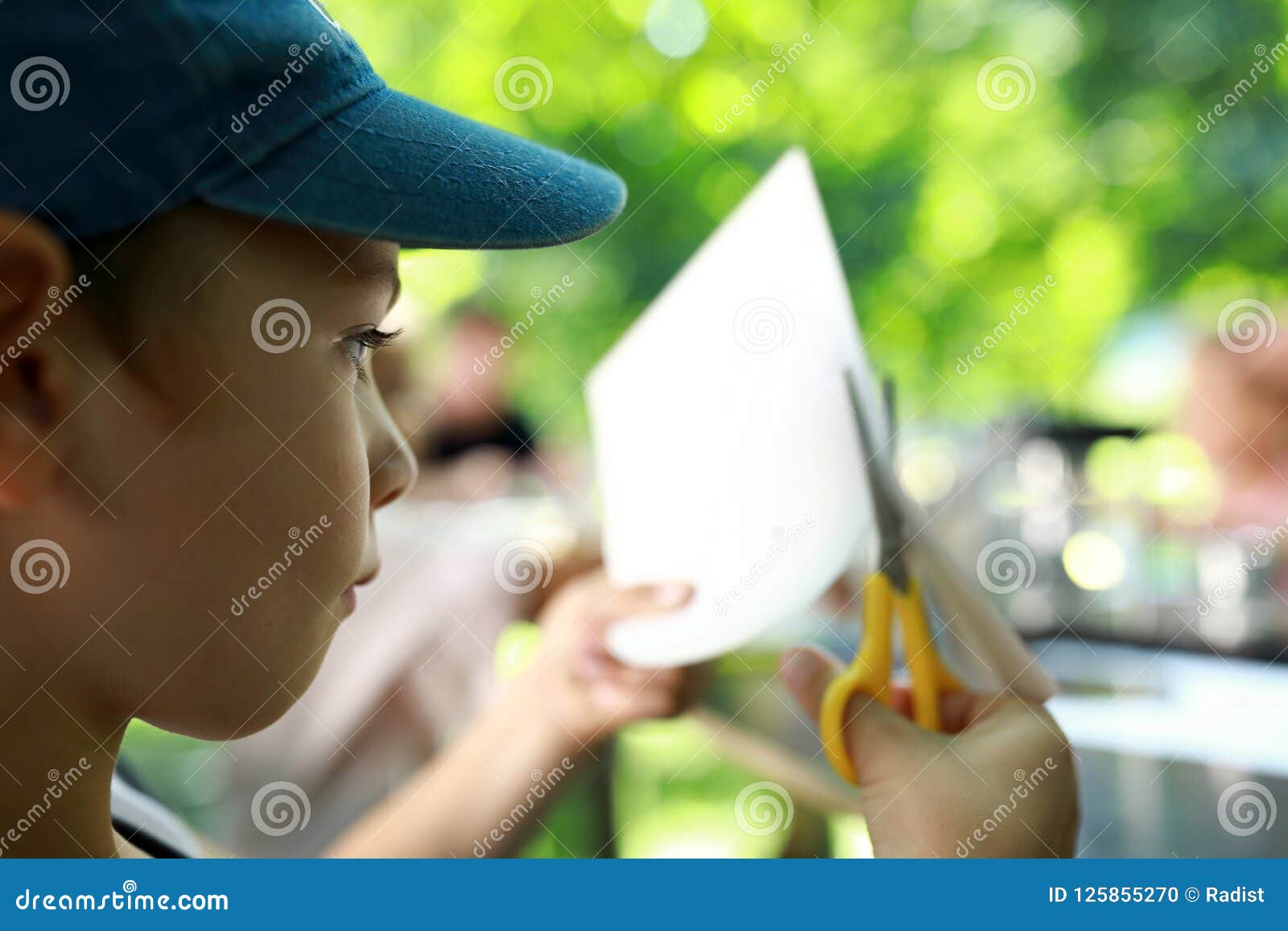 Kid cuts circle stock photo. Image of hand, cutting - 125855270