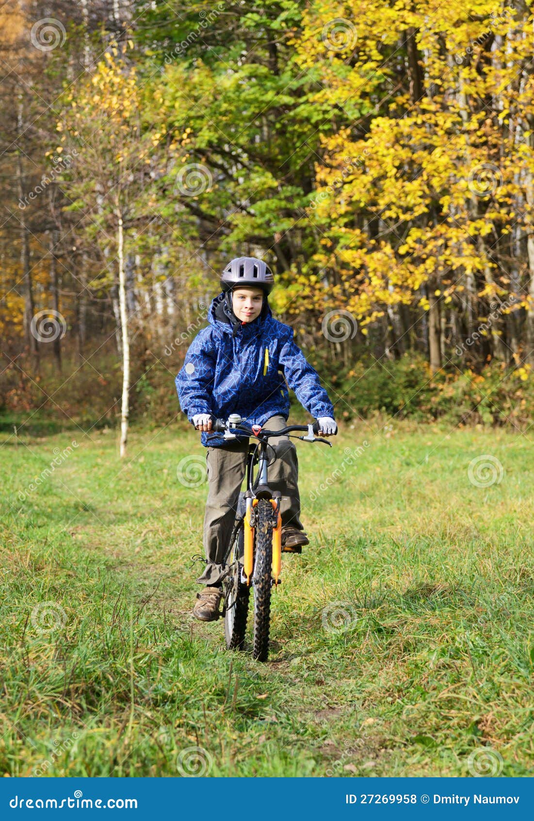 Kid cycling in a park stock photo. Image of mountain - 27269958