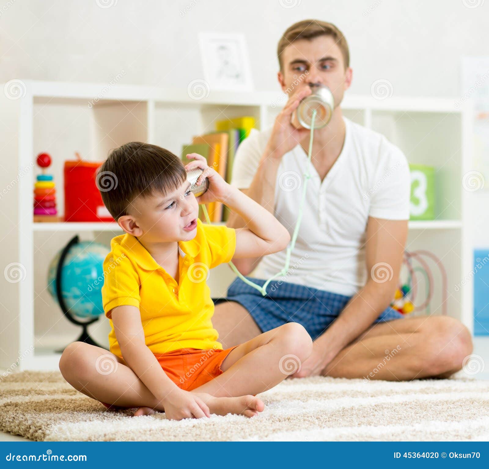 Kid and Dad Having a Phone Call with Tin Cans Stock Photo - Image of ...