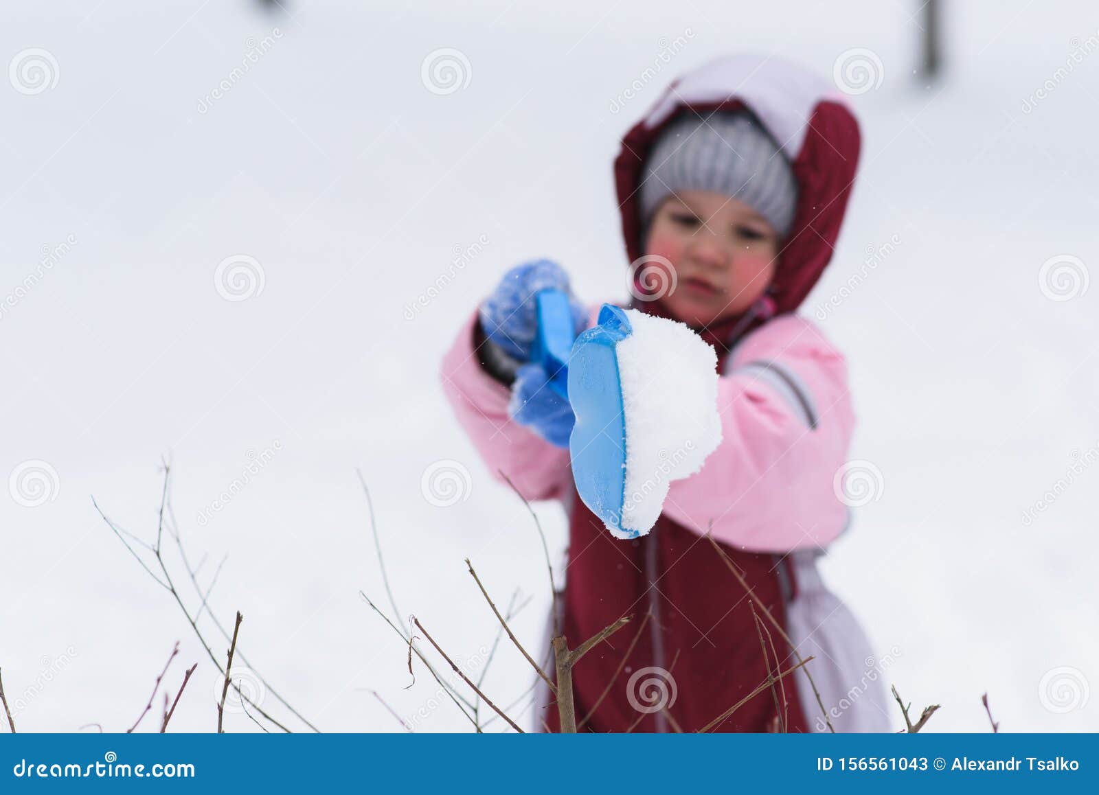 The Kid is Digging the Snow with a Shovel Stock Image - Image of ...
