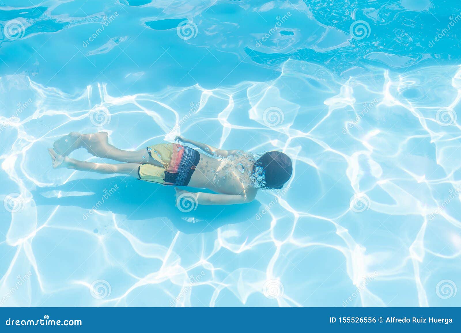 Kid Diving in a Swimming Pool Stock Photo - Image of playing, blue ...