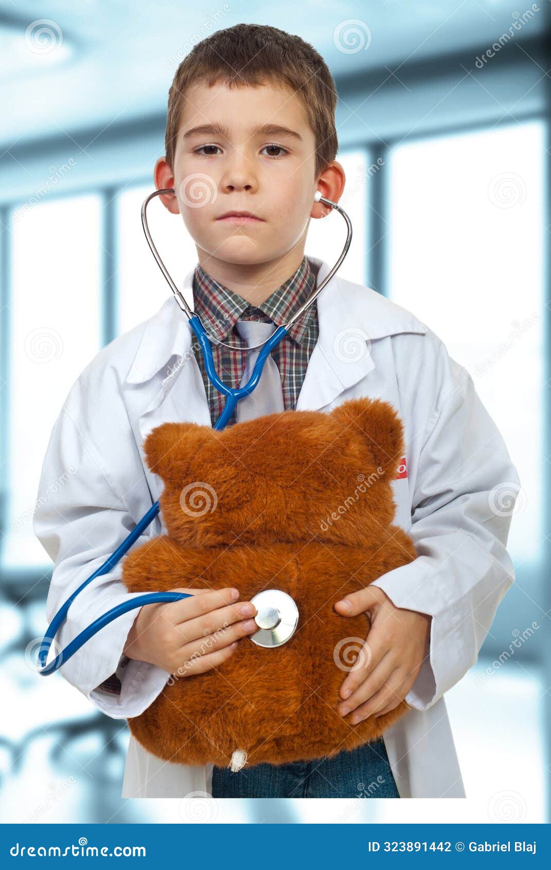 Kid Doctor Playing Plush Toy Stock Photo - Image of medical, young ...