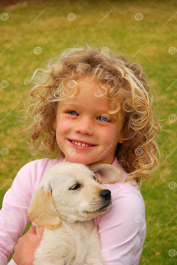 Kid with dog stock image. Image of blond, backyard, breed - 6849299