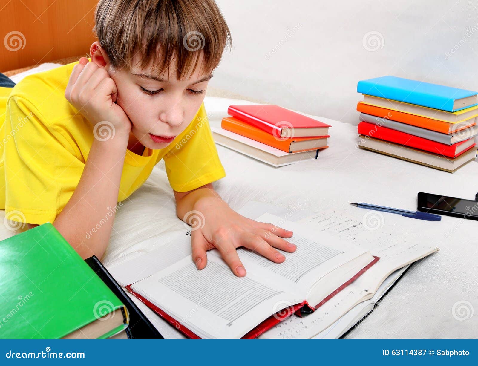 Kid doing Homework stock image. Image of childhood, casual - 63114387