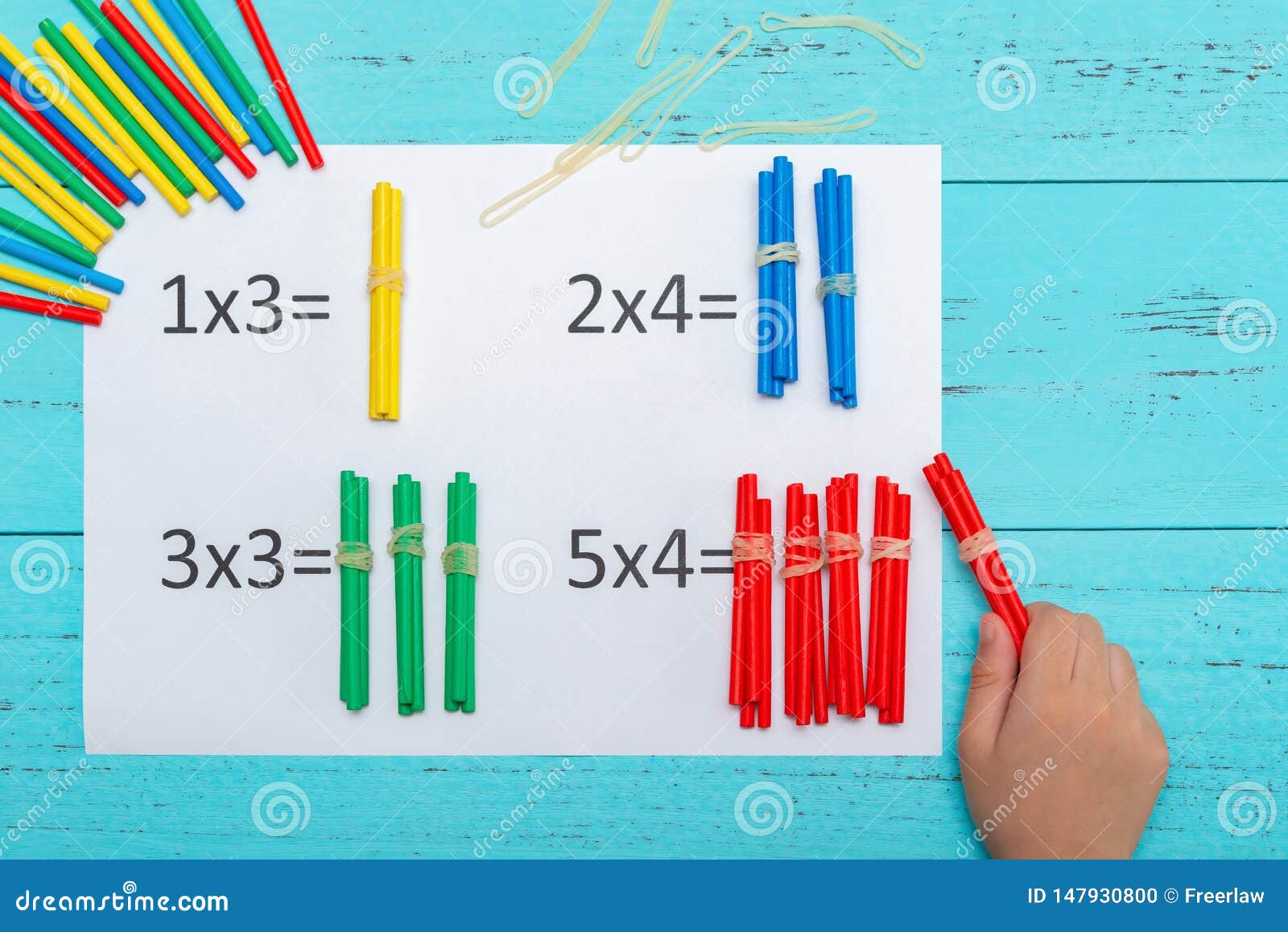Kid Doing Multiplication Equation Using Counting Rods Stock Photo ...