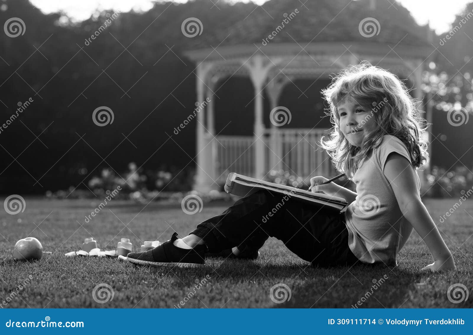 Kid Draws in Park Having Fun on Nature Background. Children Creative ...