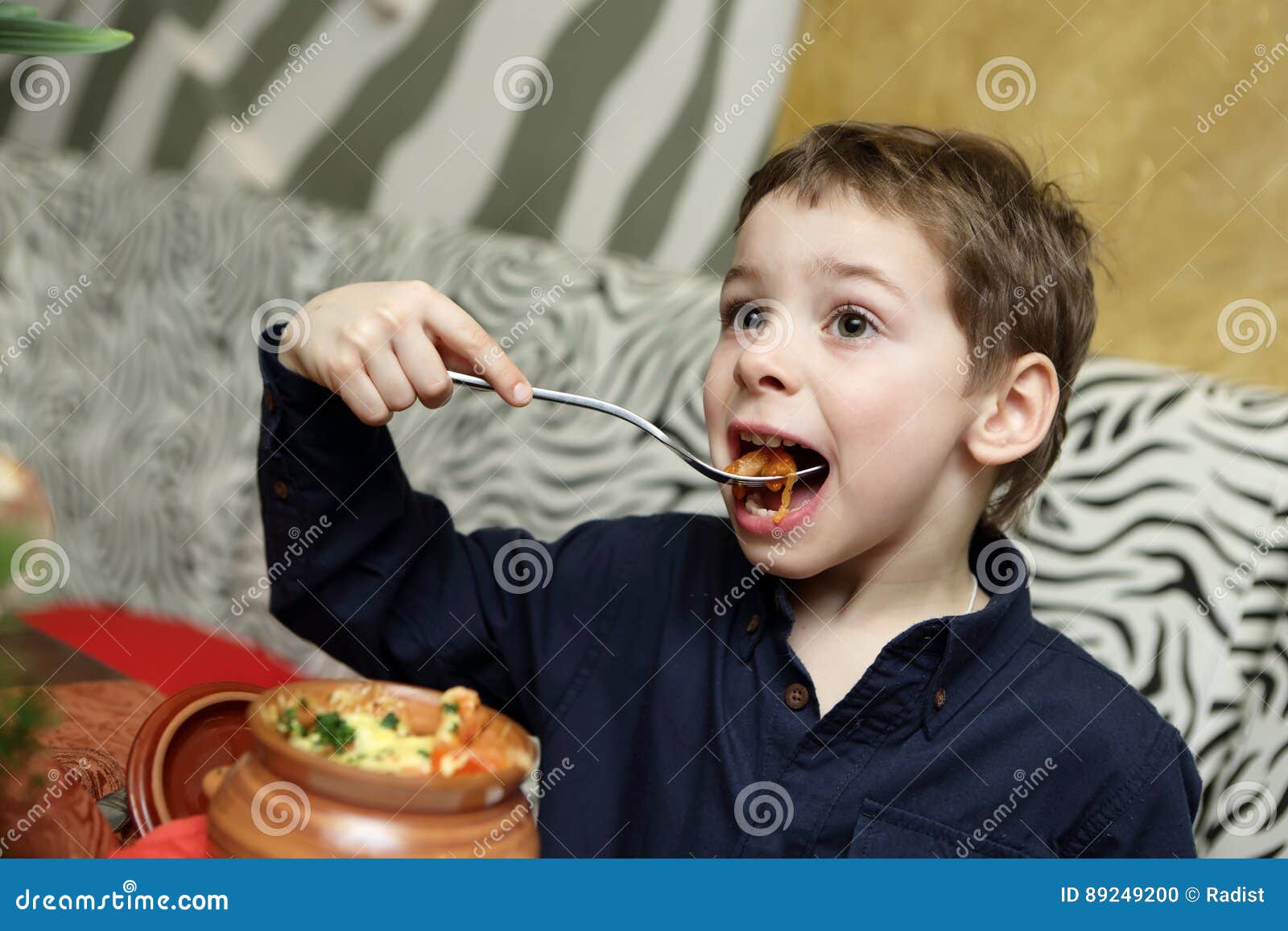 Kid Eating Baked Vegetables Stock Photo - Image of indoor, lifestyle ...